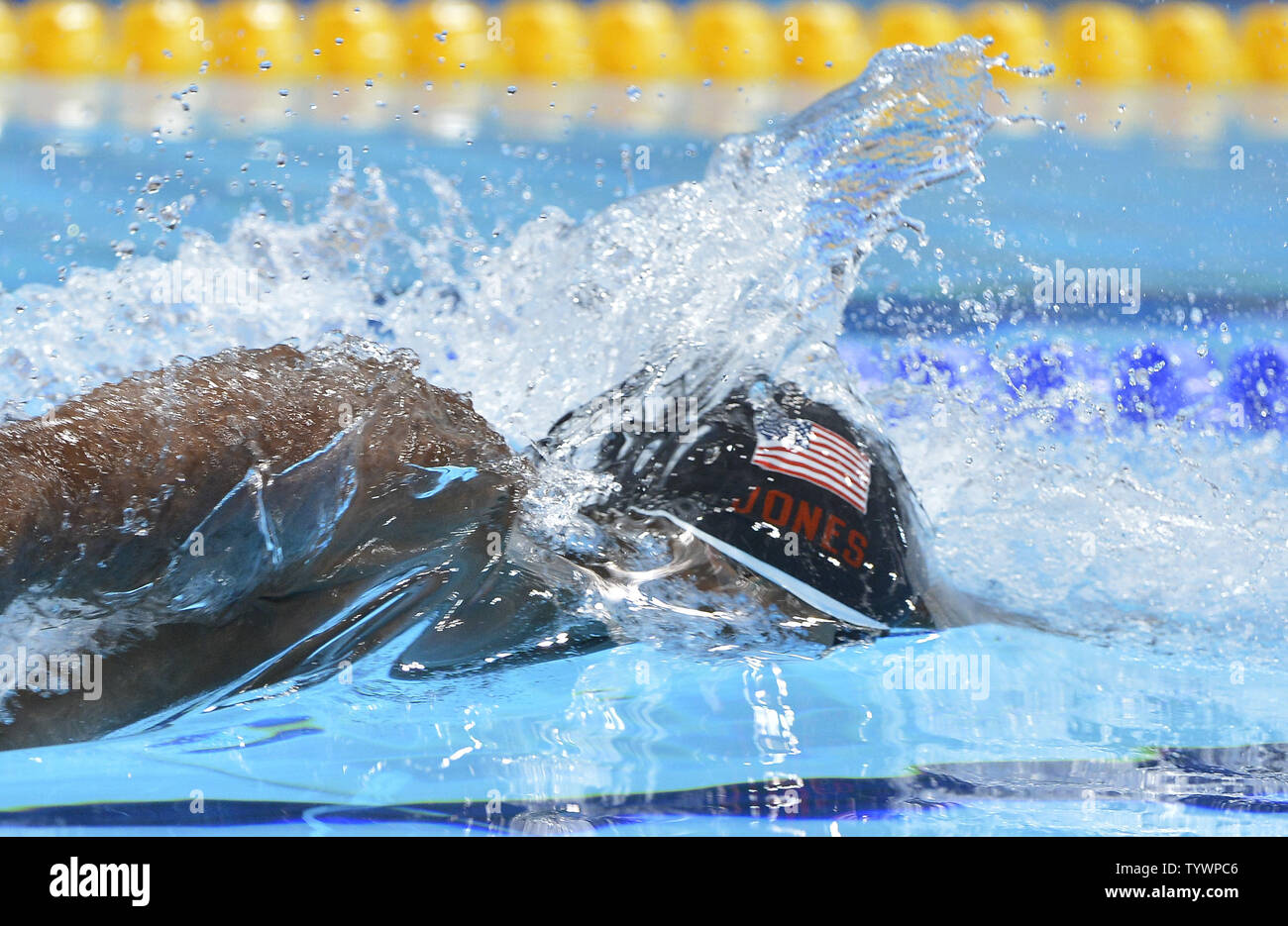 Cullen Jones of the United States swims his heat in the Men's 100M ...
