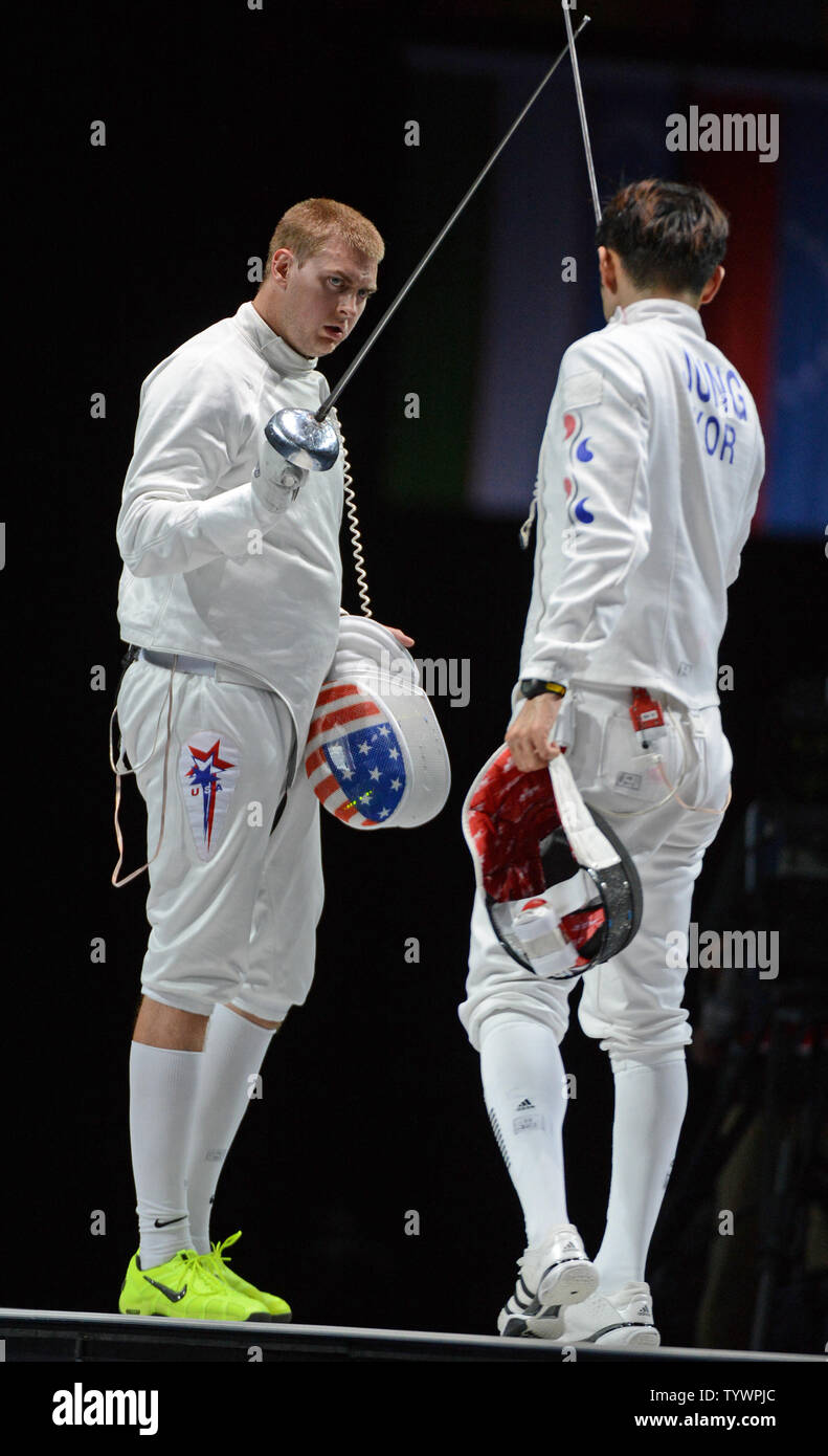 Seth Kelsey of the USA (L) prepares to fence with Ruben Limardo Gascon ...
