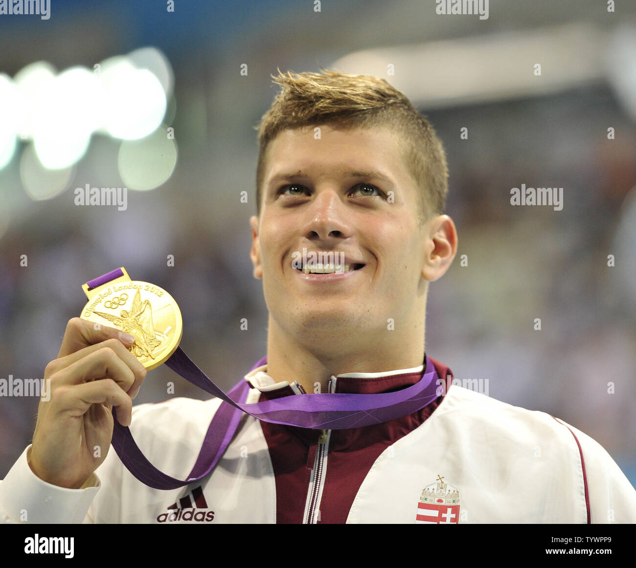 Daniel Gyurta of Hungary holds up his Gold Medal in the Men's 200M ...