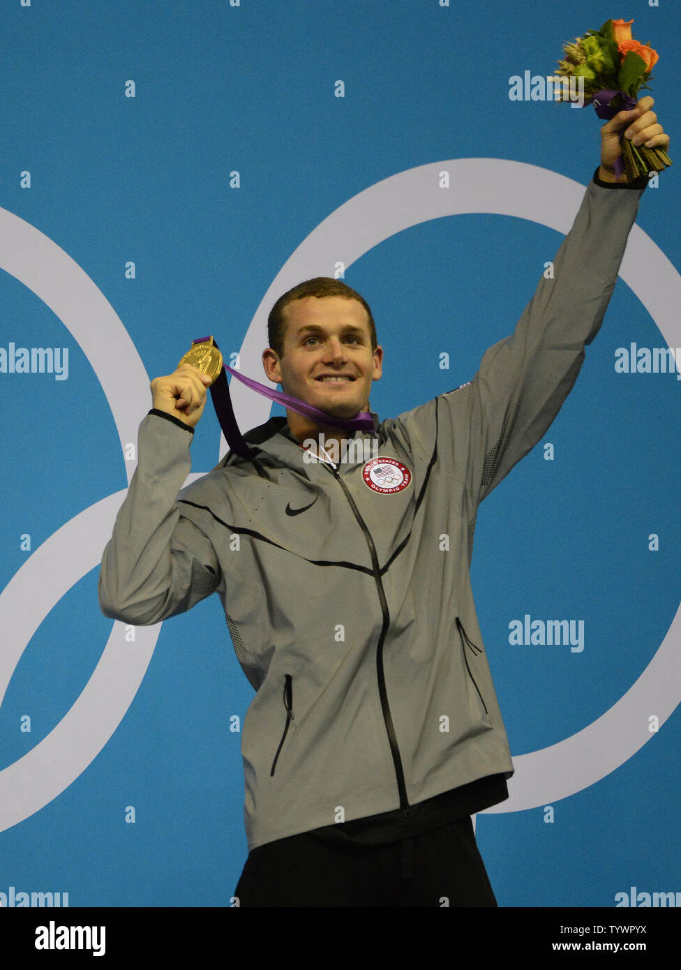 Tyler Clary of the United States acknowledges the cheers of the crowd ...