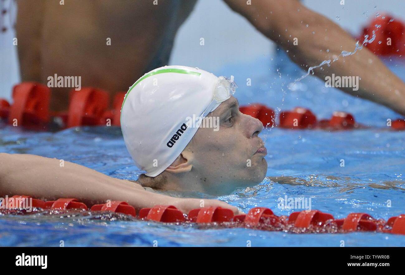 Cesar Cielo of Brazil looks at the scoreboard after his heat in the Men ...