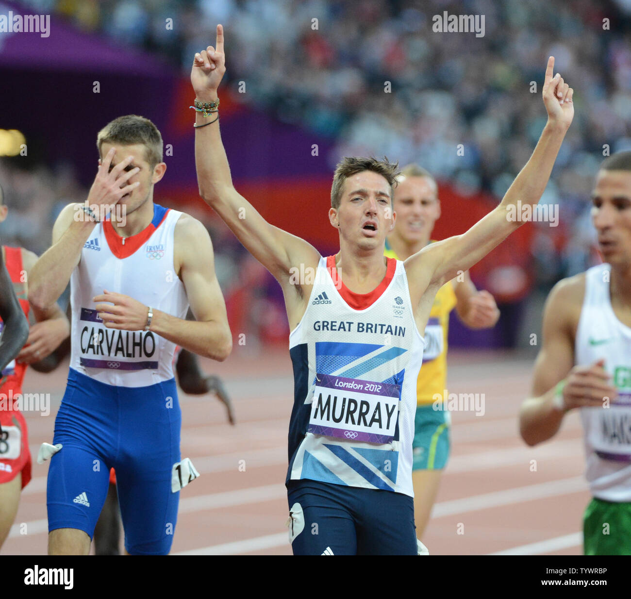 Ross Murray of Great Britain celebrates after crossing the finish line ...