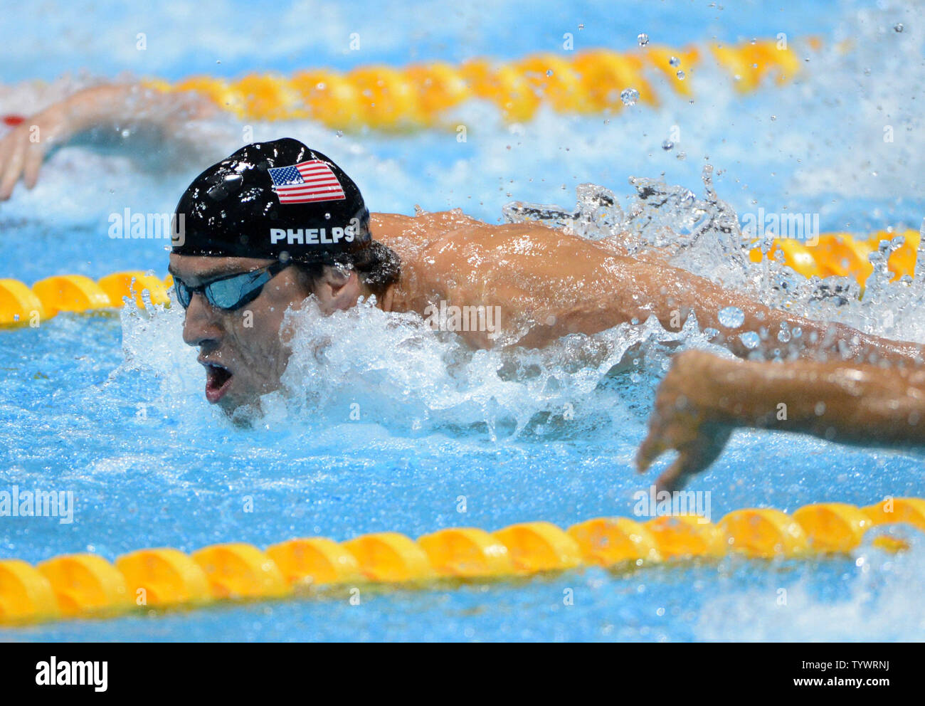 USA's Michael Phelps swims the Butterfly leg of the Men's 4x100 Medley ...