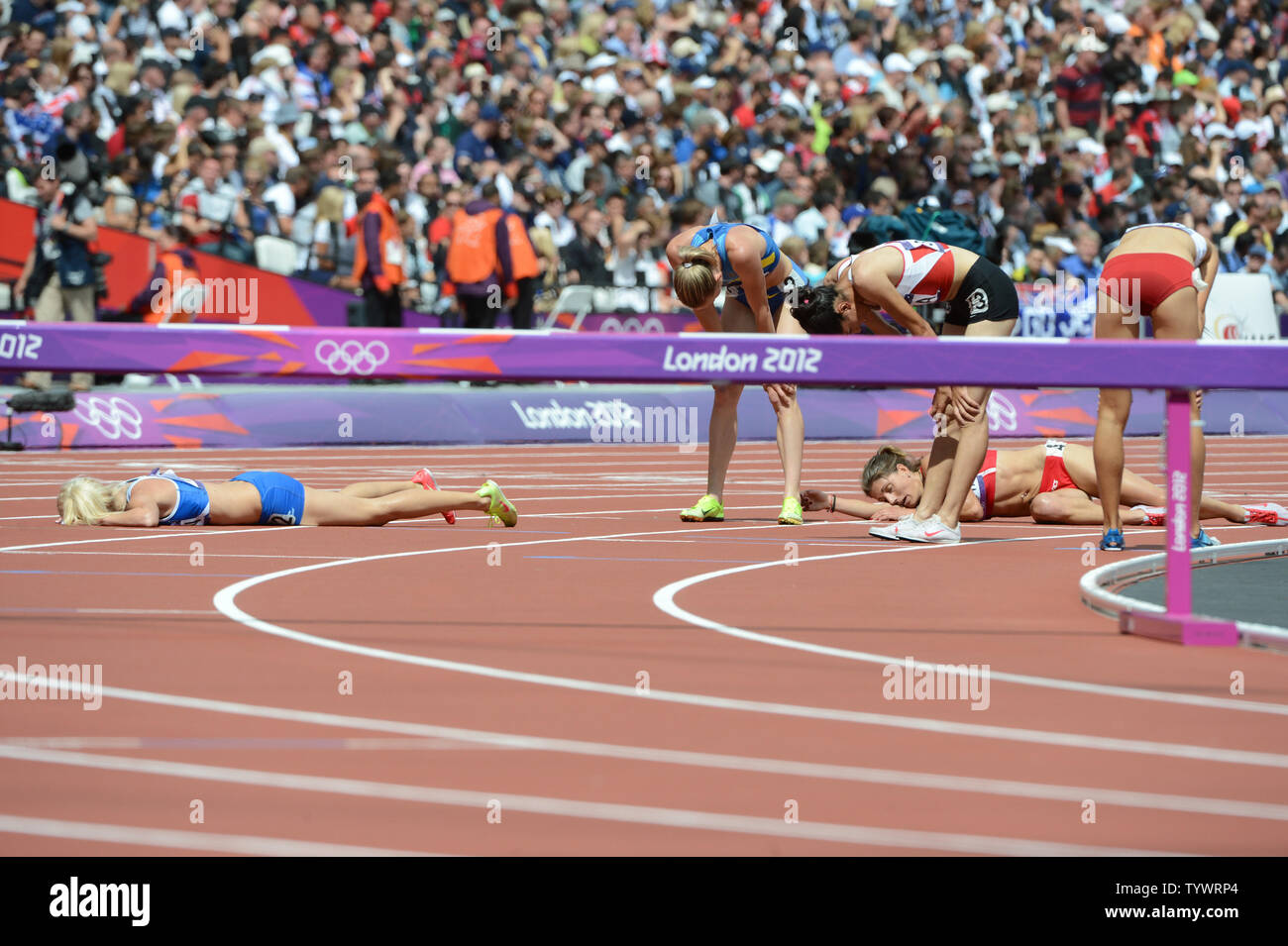 Exhaustion shows on the runners at the finish line in round one of the ...