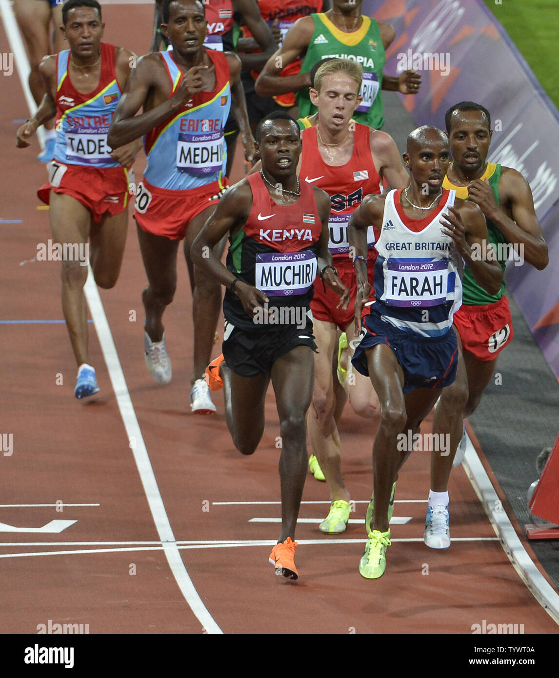 Britain's Mohamed Farah (R) leads the pack as Kenya's Bedan Karoki ...