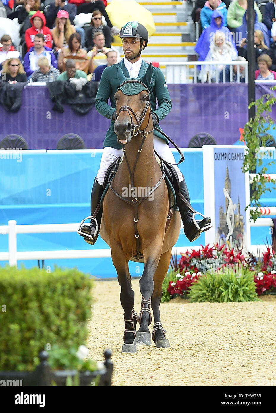 Kamal Bahamdan of Saudi Arabia, riding Or de la Charboniere, competes ...