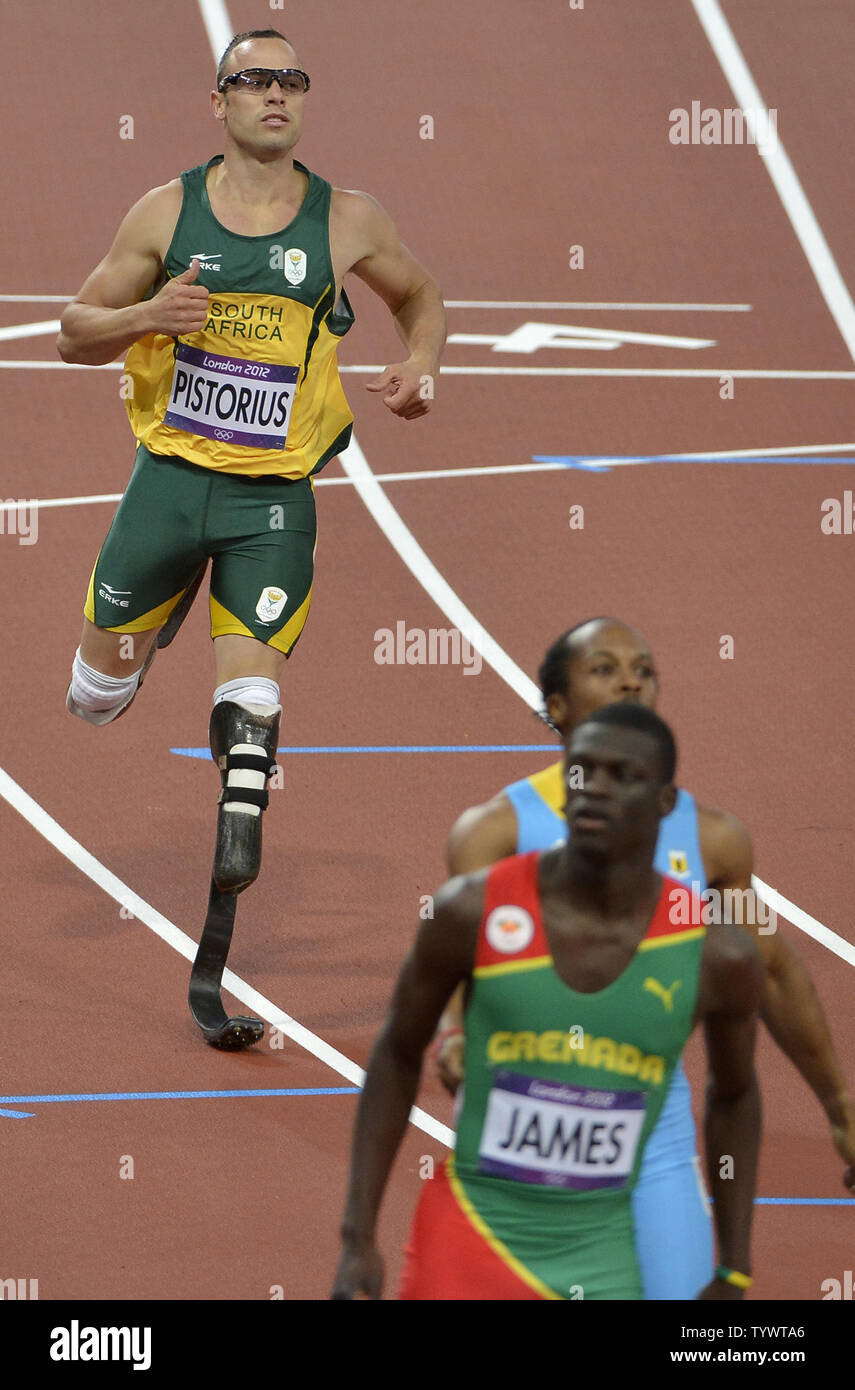 South African sprinter Oscar Pistorius (L) finishes in last place in a ...