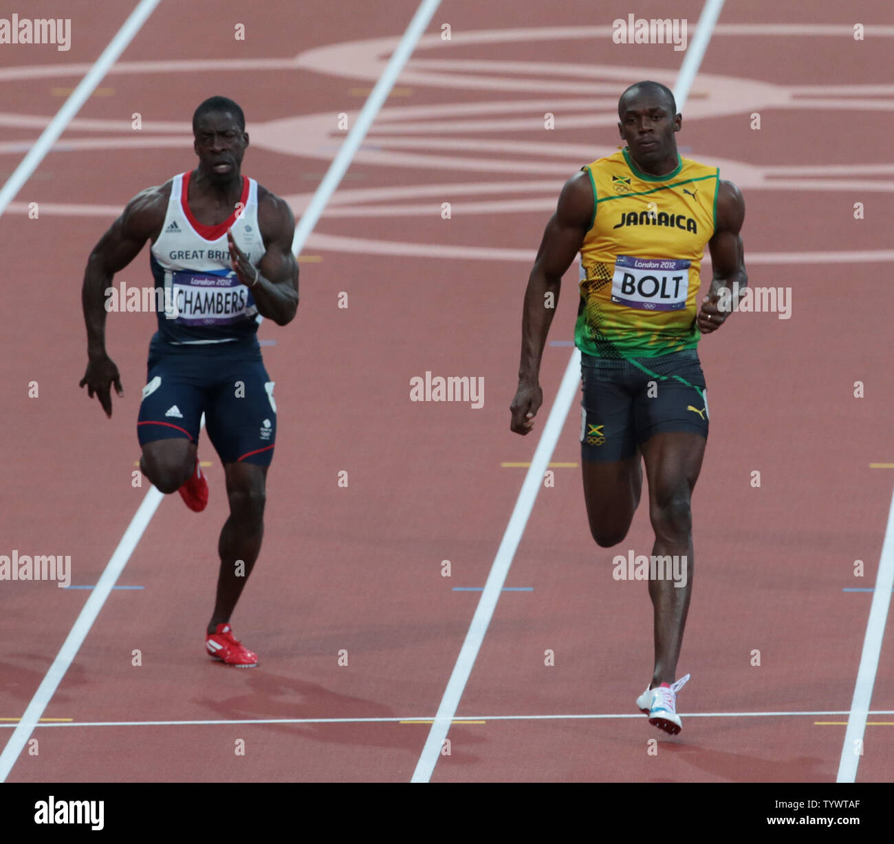 Great Britain's Dwain Chambers (L) and Jamaica's Usain Bolt in action ...