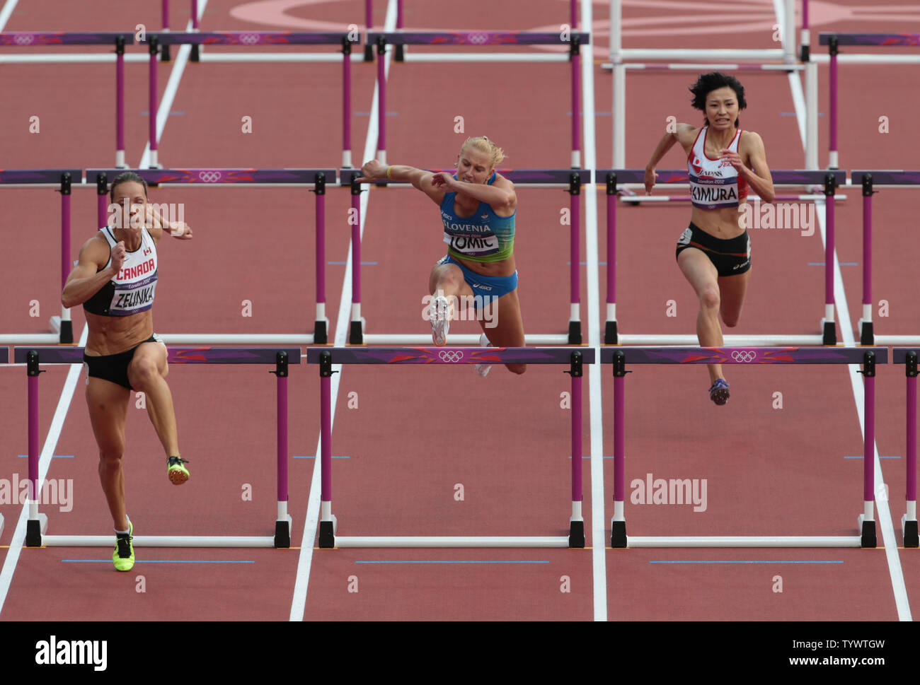 Canada's Jessica Zelinka,Slovenia's Marina Tomic and Ayako Kimura in ...