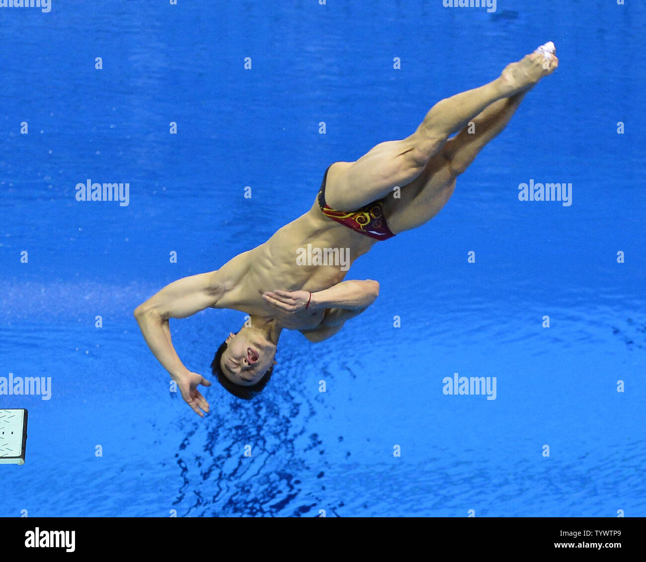 Kai Qin of China competes in the Men's 3m Springboard Diving final at ...