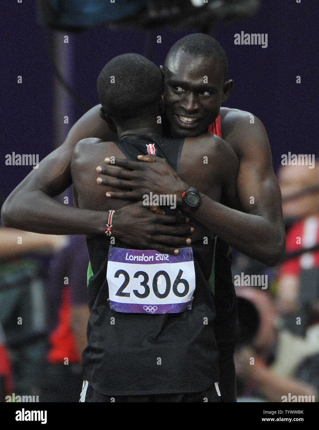 David Lekuta Rudisha of Kenya (R) hugs teammate Timothy Kitum after ...