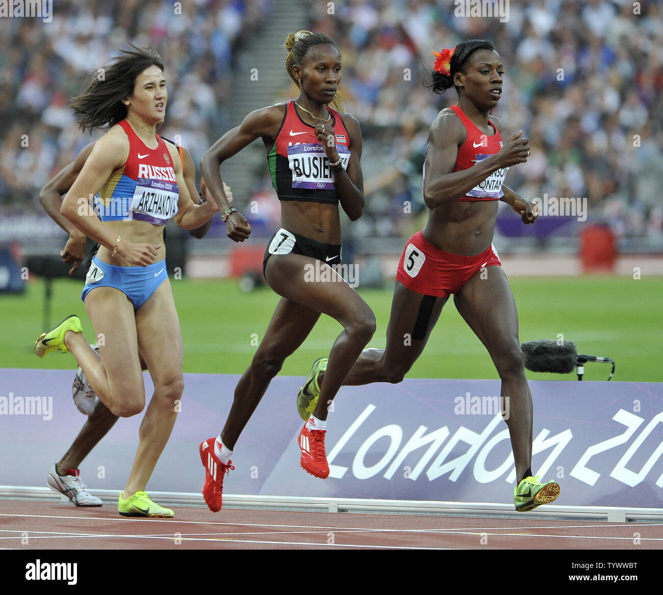 Elena Arzhakova of Russia (L-R), Janeth Jepkosgei Busienei of Kenya and ...