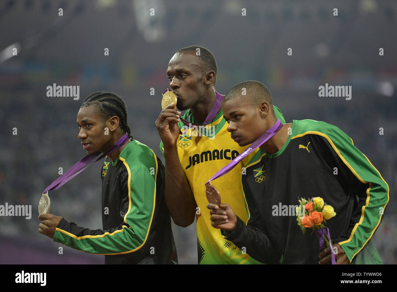Silver Medalist Yohan Blake (L-R), Gold Medalist Usain Bolt and Bronze ...