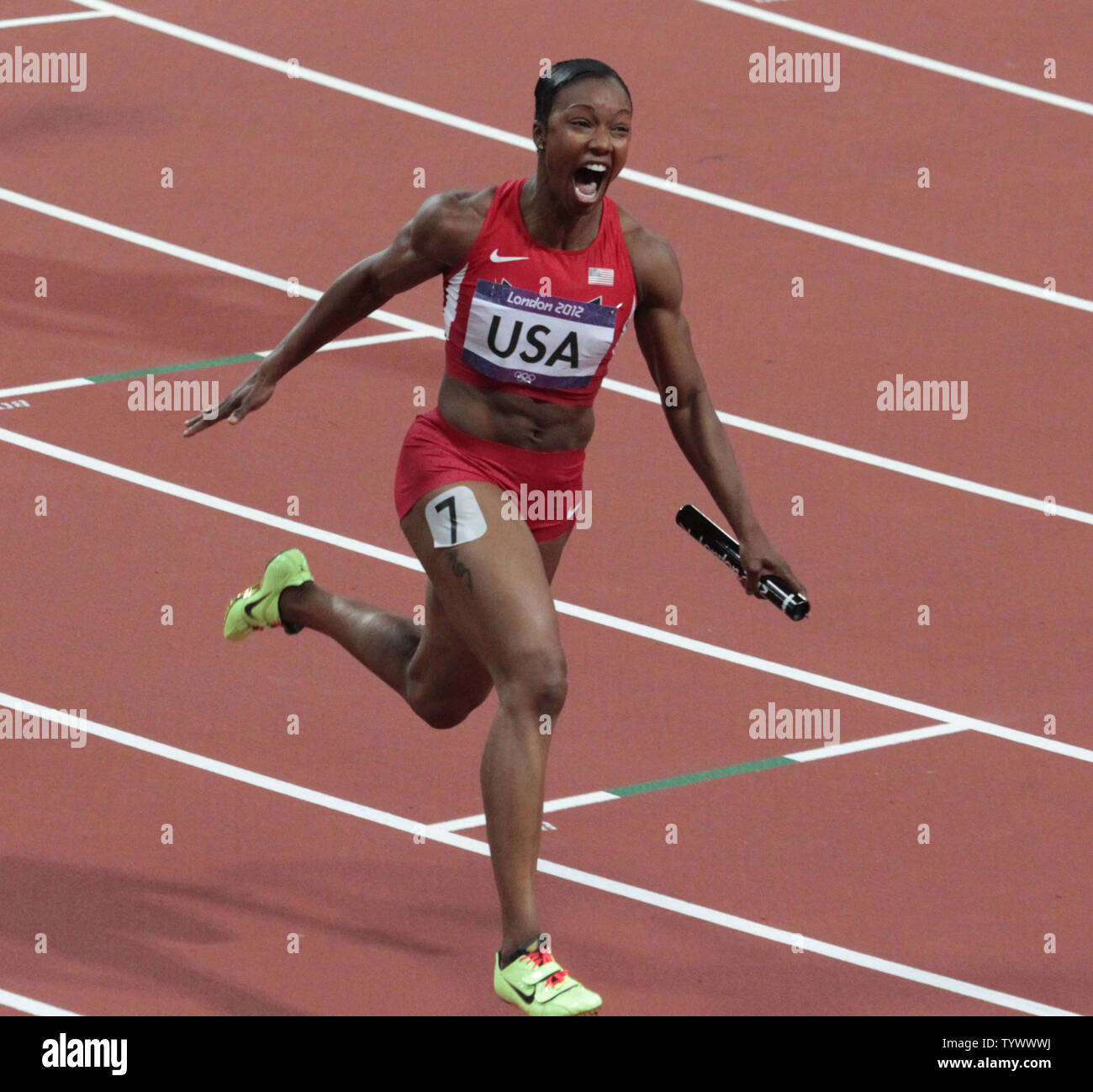 America's Carmelita Jeter celebrates after completing the anchor leg in ...