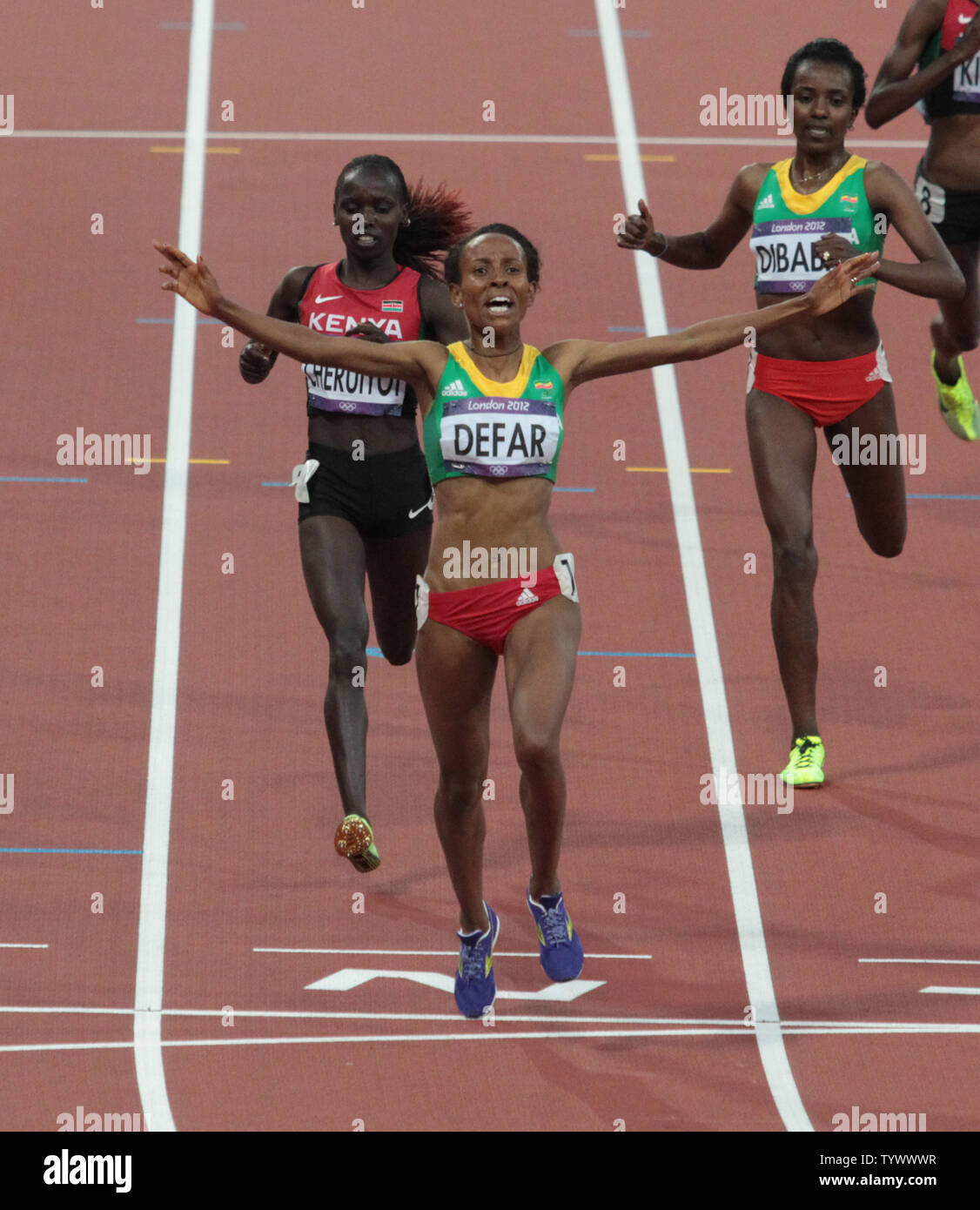 Ethiopia's Meseret Defar celebrates winning the Women's 5000 metres ...