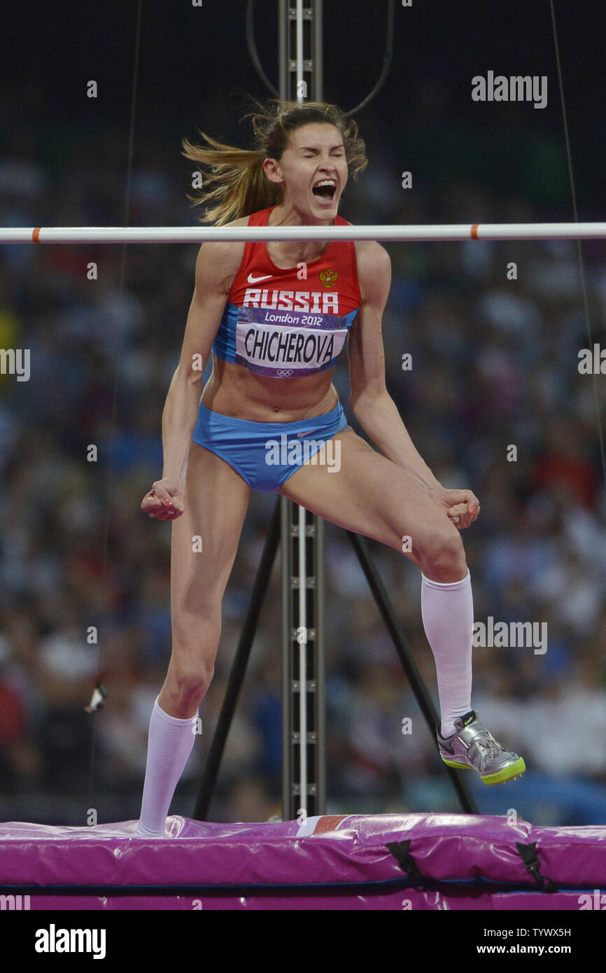 Anna Chicherova of Russia reacts after successfully jumping at 2.05M to ...