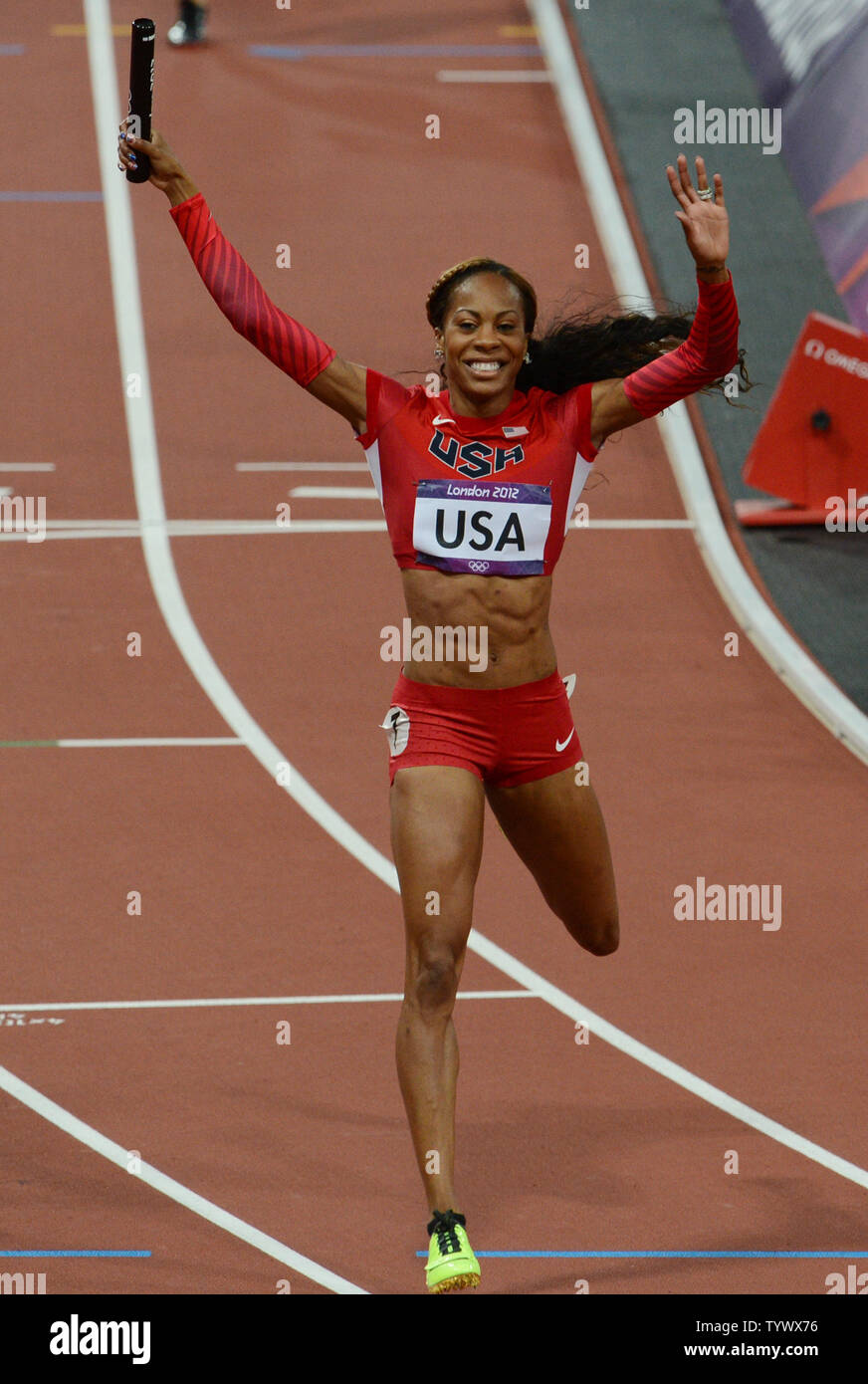 America's Sanya Richards-Ross celebrates a win in the 4x400 Women's ...