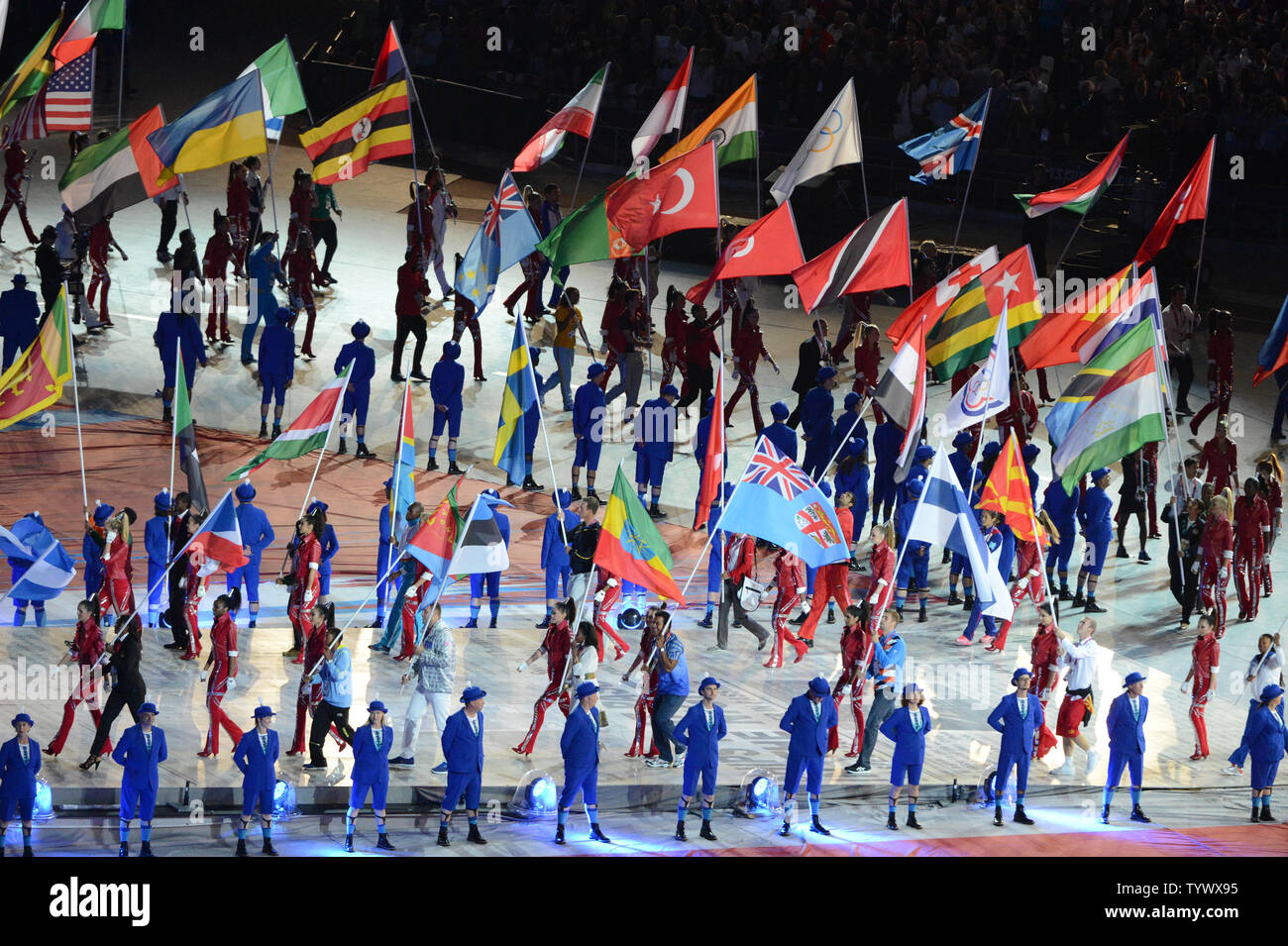 Flags of the Olympic nations parade at the closing ceremony of the ...