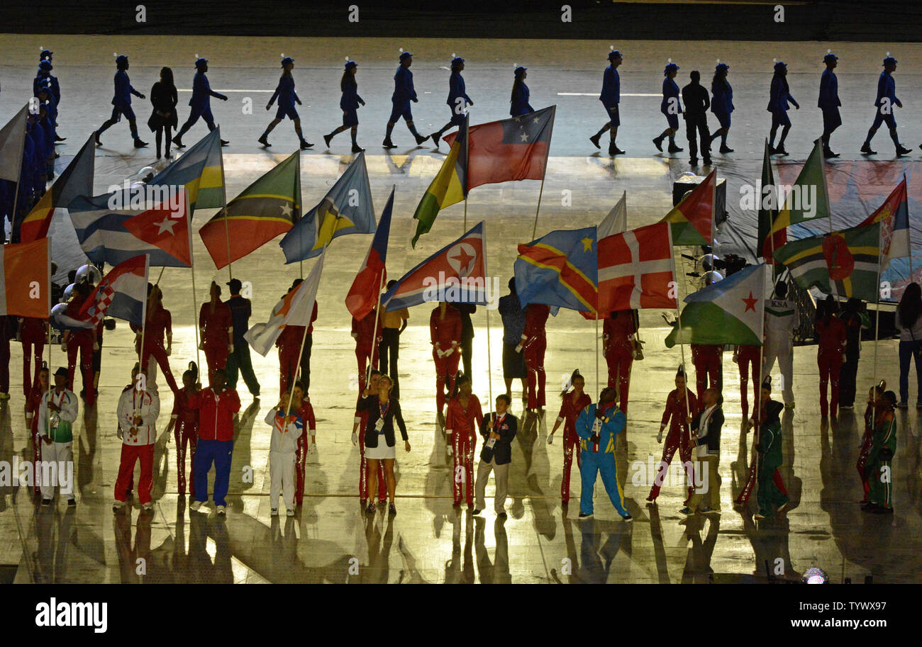 Flags of the Olympic nations parade at the closing ceremony of the ...