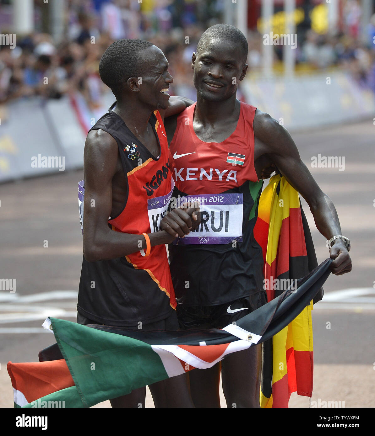 Gold Medalist Stephen Kiprotich of Uganda celebrates with Silver ...