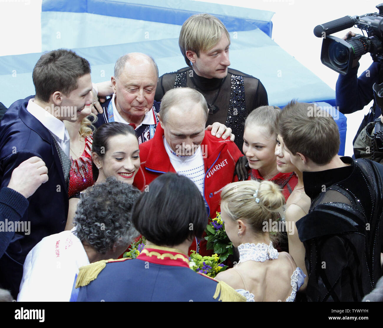 Russian President Vladimir Putin arrives to congratulate members of ...