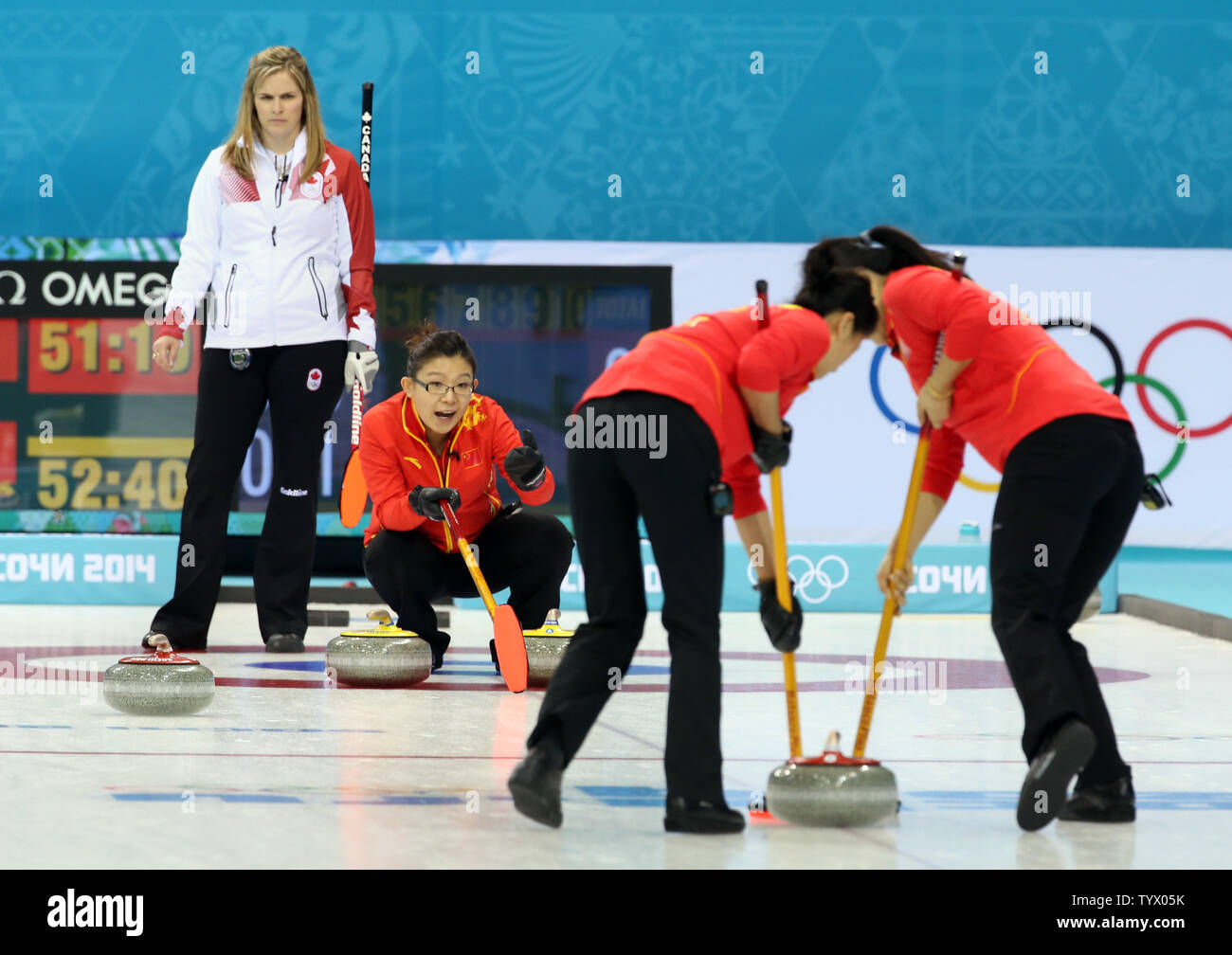 Canadian skip and famed curler Jennifer Jones signals to teammates ...