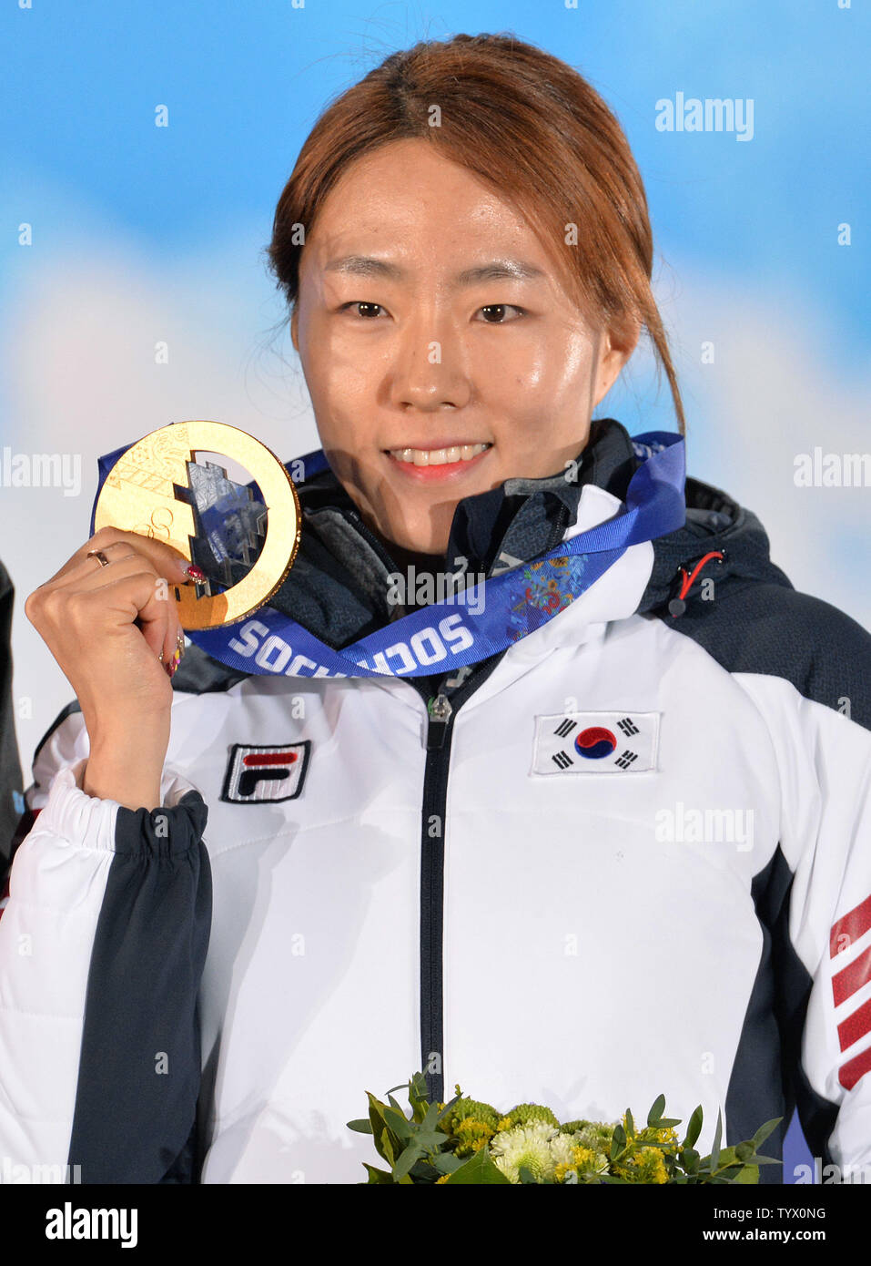 Gold Medalist South Koreas Sang Hwa Lee Poses With Her Medal During The Victory Ceremony For