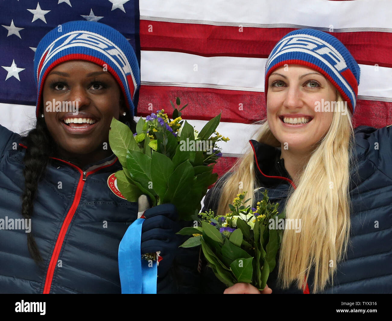 U.S. bronze medalists, pilot Jamie Greubel (R) and brakewoman Aja Evans ...