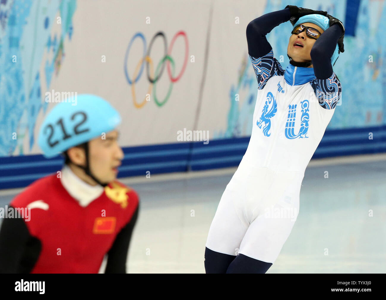 Russia's Victor An, gold, celebrates after crossing first the finish ...