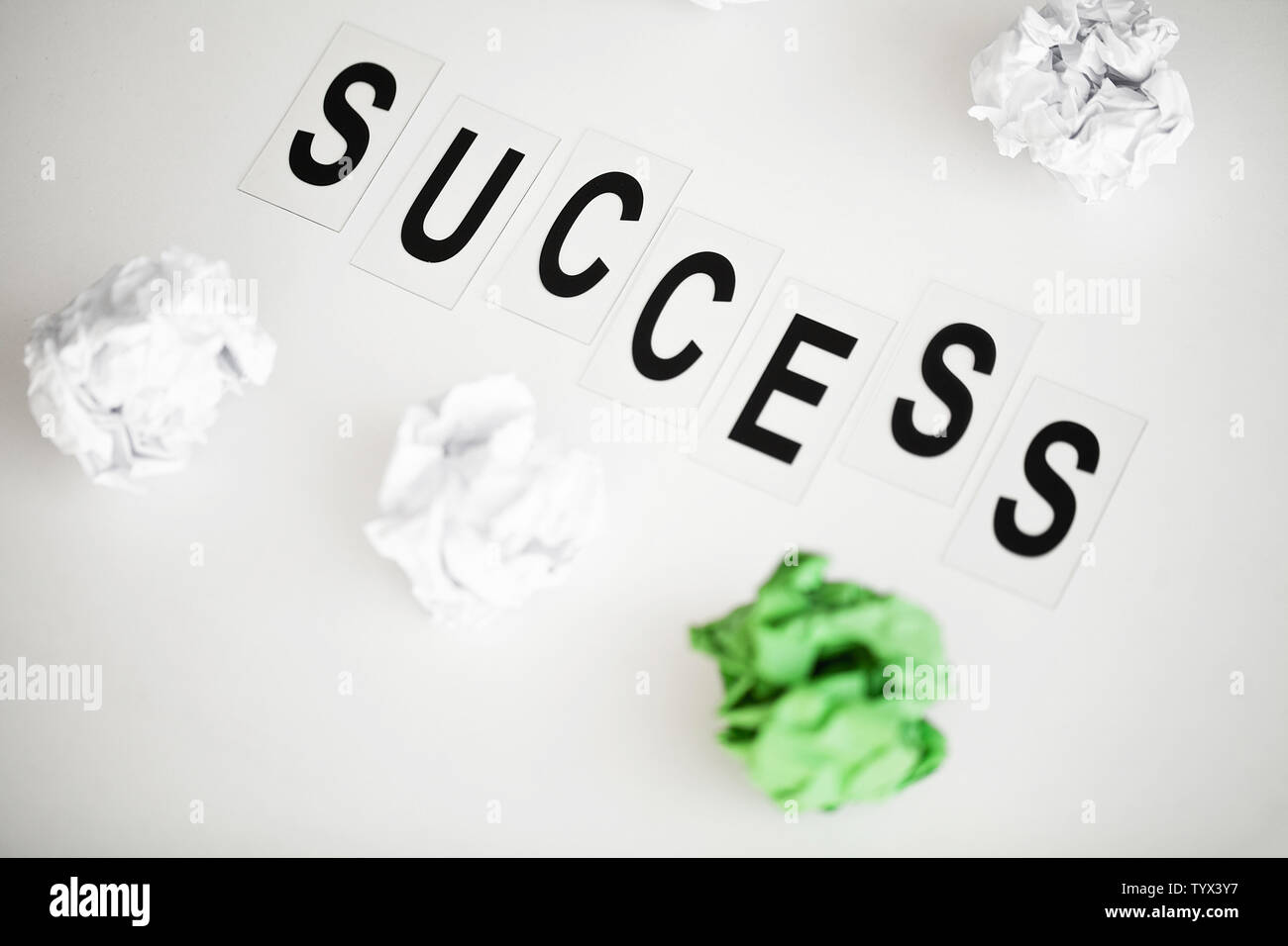 Success word written on white table. Copy space Stock Photo - Alamy