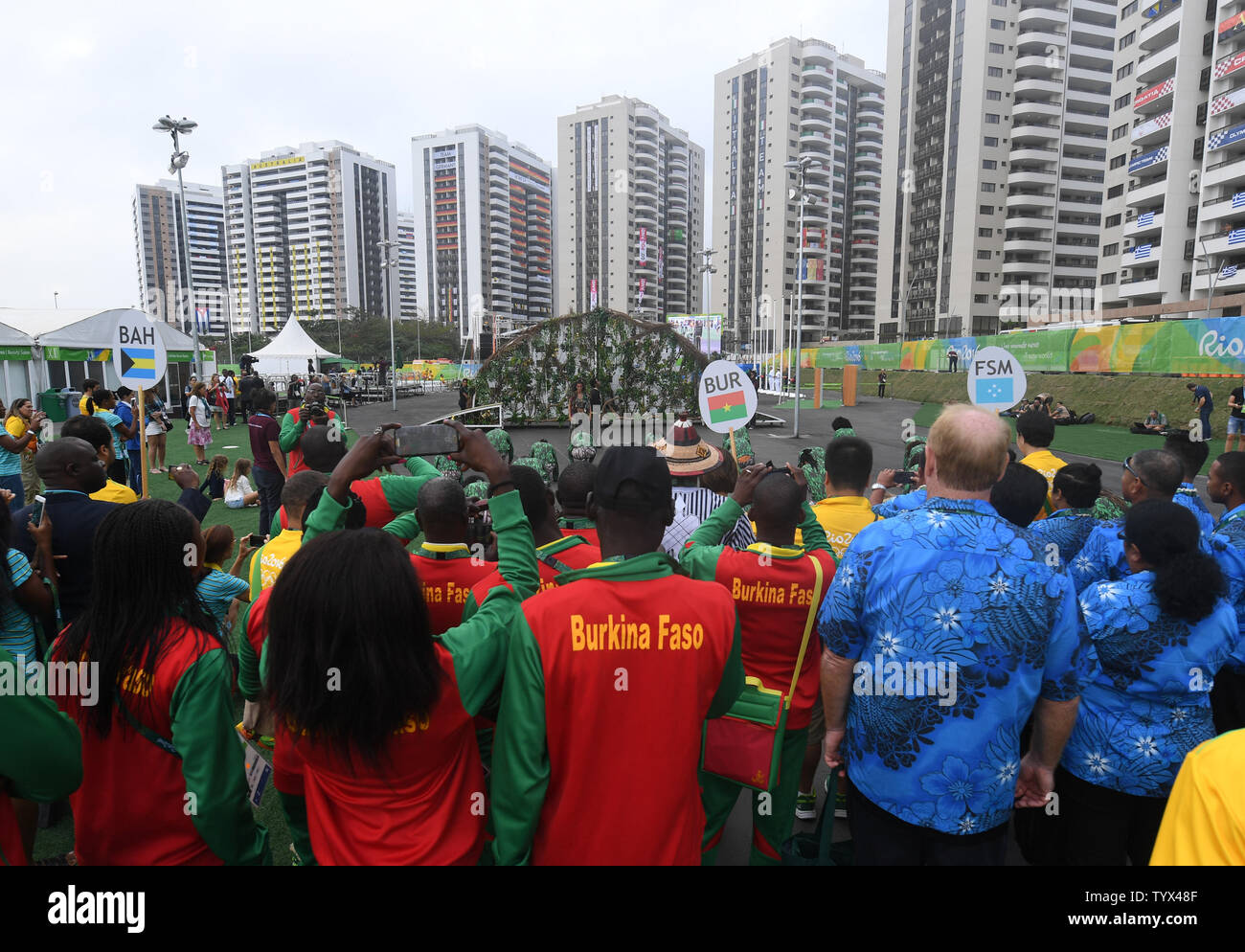Olympians from Burkina Faso are welcomed the Olympic Athletes Village ...