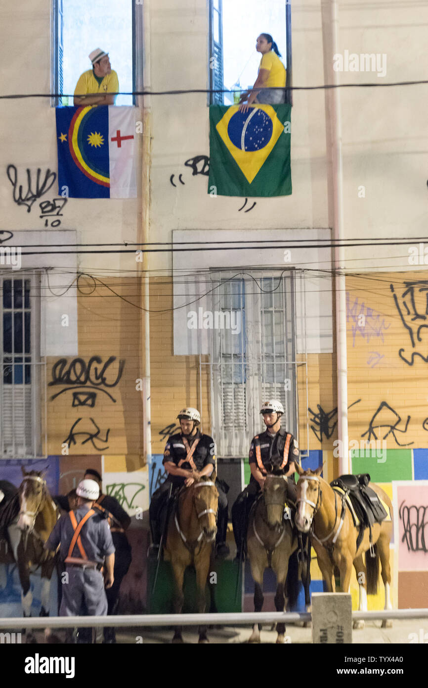 Brazilian riot police on horseback stand guard near the Rio Olympics ...