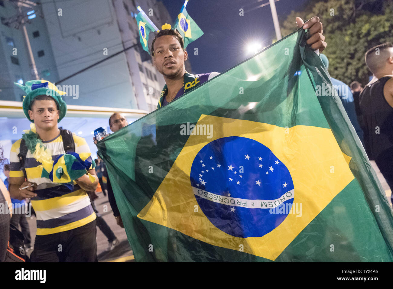 Brazilian supporters gather for the opening ceremonies outside the Rio ...