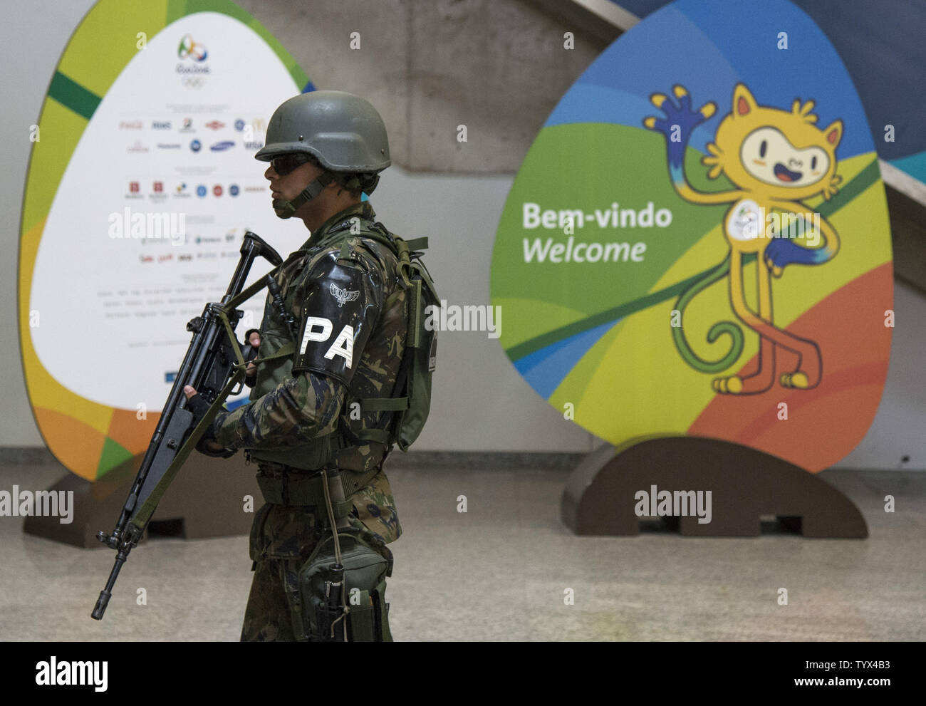 A security personnel patrols at the Rio de Janeiro–Galeao International ...