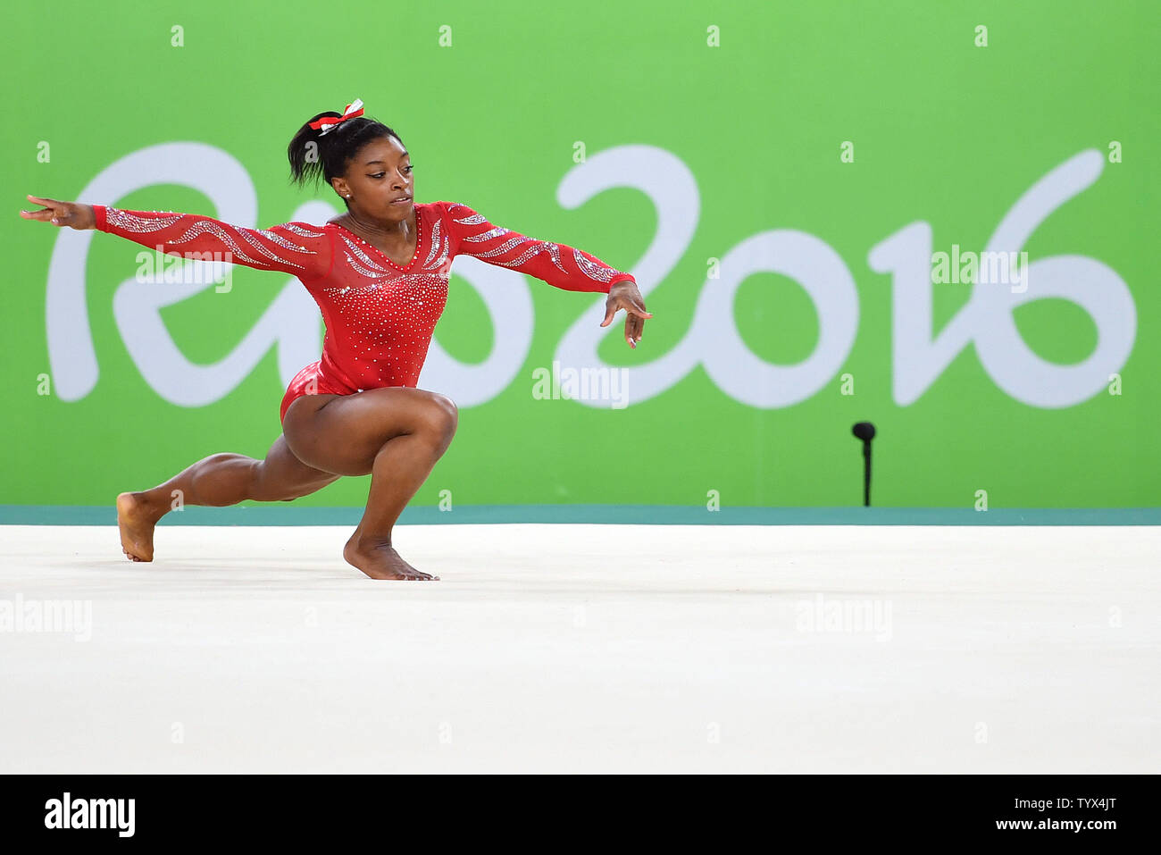 U.S. women's gymnastics member Simone Biles practices her routine on ...