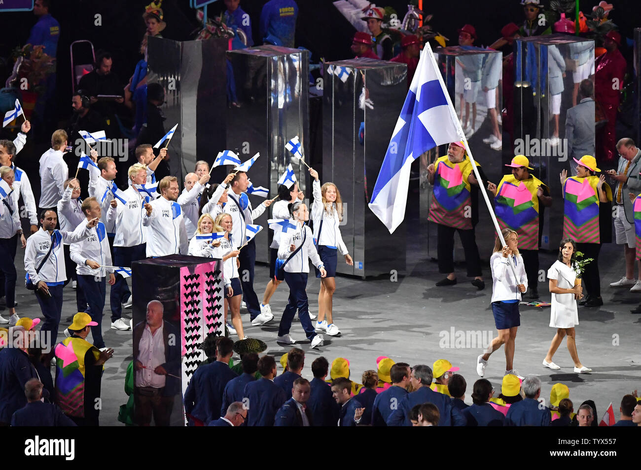 Tuuli Petaja Siren holds the flag of Finland as she leads the countries ...