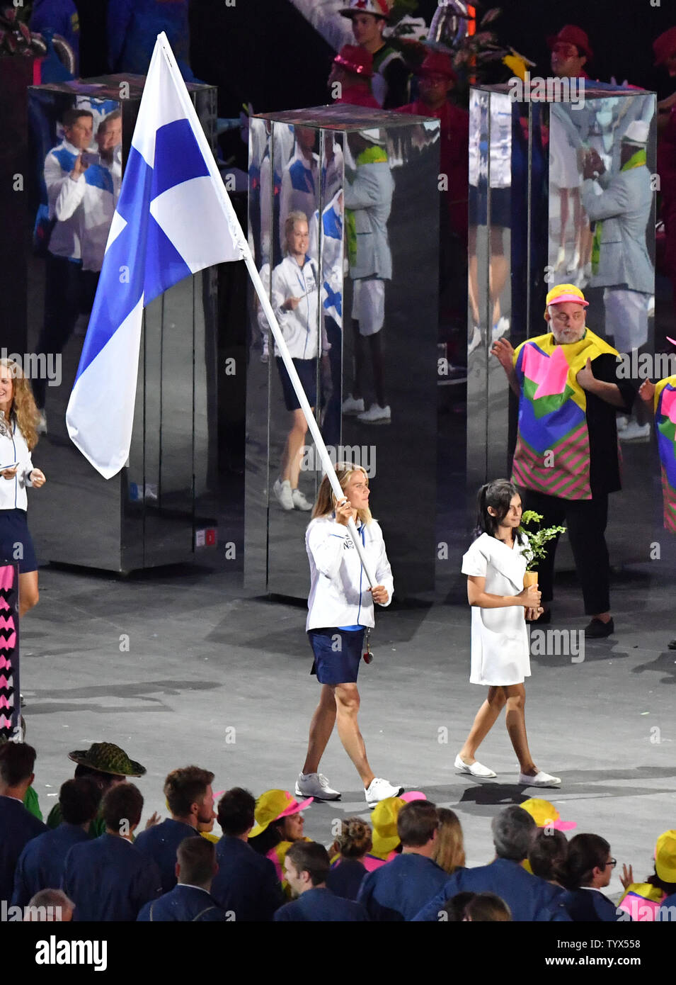 Tuuli Petaja Siren holds the flag of Finland as she leads the countries ...