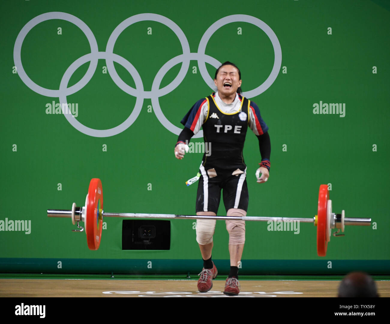Taiwan's Wei-Ling Chen yells as she misses an attempt in the snatch portion of the Women's 48 Kg ...