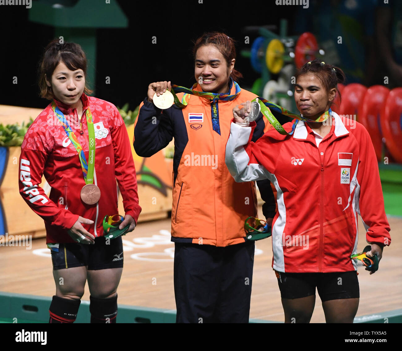 Thailand's Tanasan Sopita (C), Japan's Hiromi Miyake (L), and Sri ...