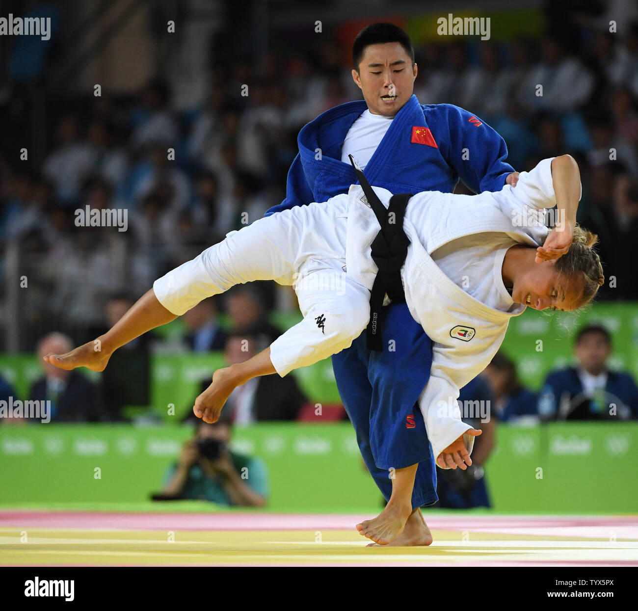 Yingnan Ma of China picks up Italy's Odette Giuffrida in women"s 52 kg ...