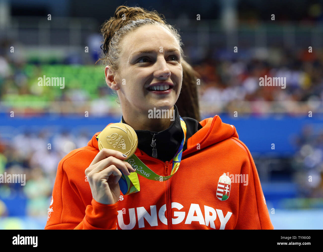 Katinka Hosszu of Hungray smiles holding the gold medal after her ...