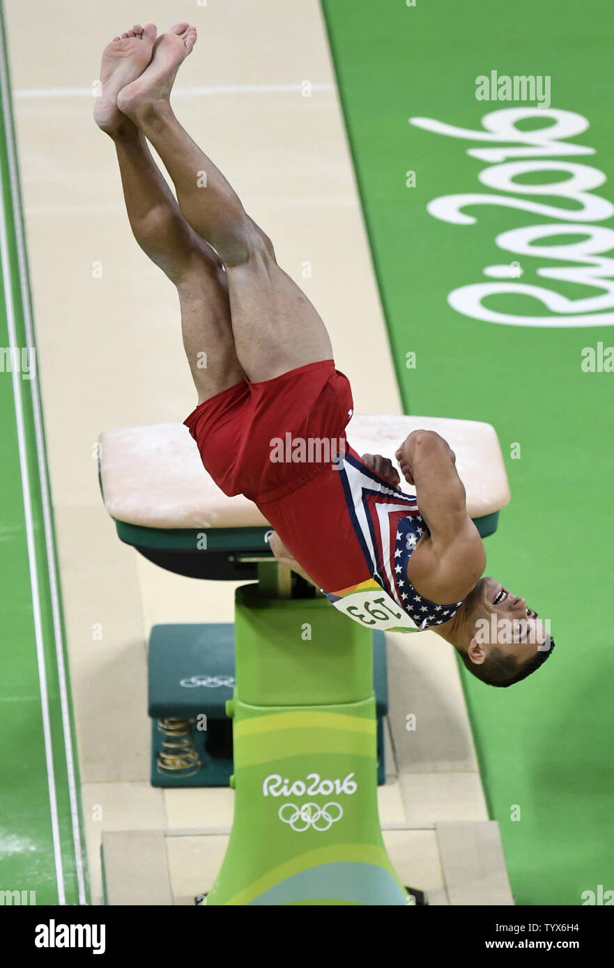 American gymnast Jacob Dalton is airborne during the Vault competition ...
