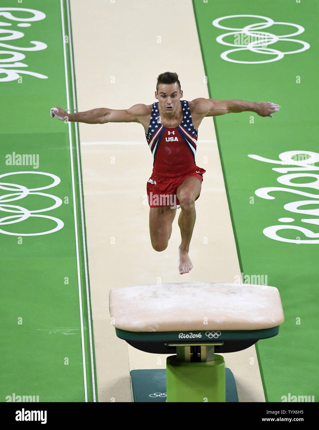 American gymnast Samuel Mikulak races to the Vault during competition ...