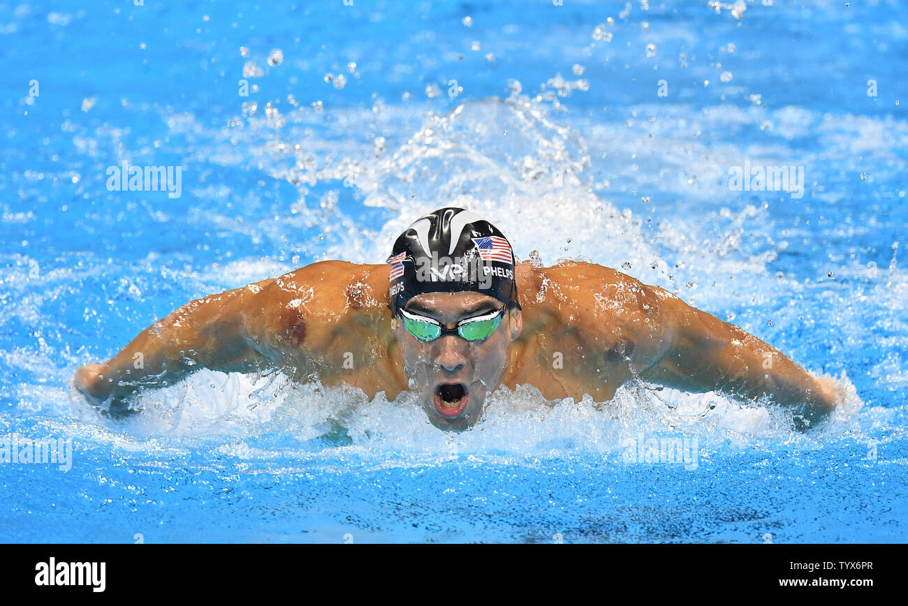 Michael Phelps of the United States competes and wins the gold medal in ...