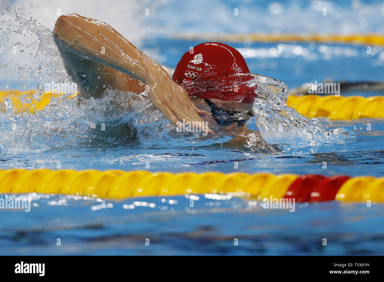 Great Britain's Stephen Milne swims his leg of the Men's 4x200M ...