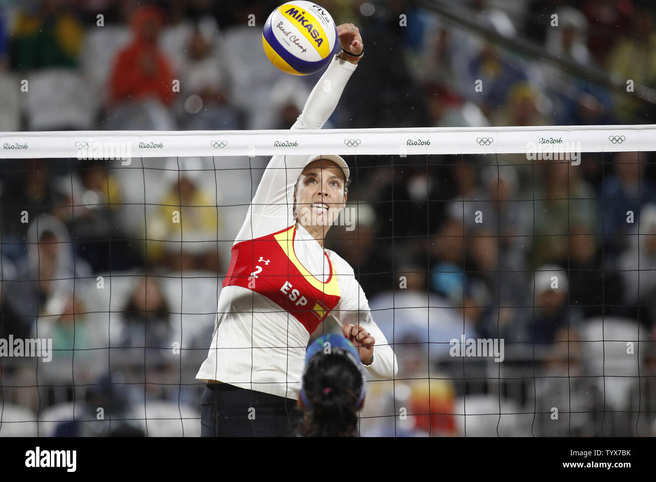 Spain's Elsa Baquerizo hits the ball towards Brazi's çgatha Bednarczuk ...