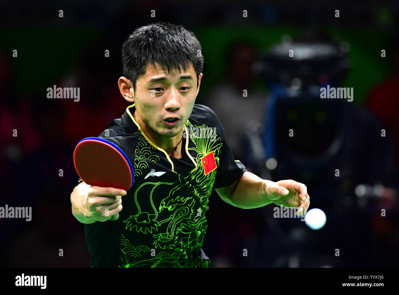 China's Zhang Jike competes against China's Ma Long in the Men's ...