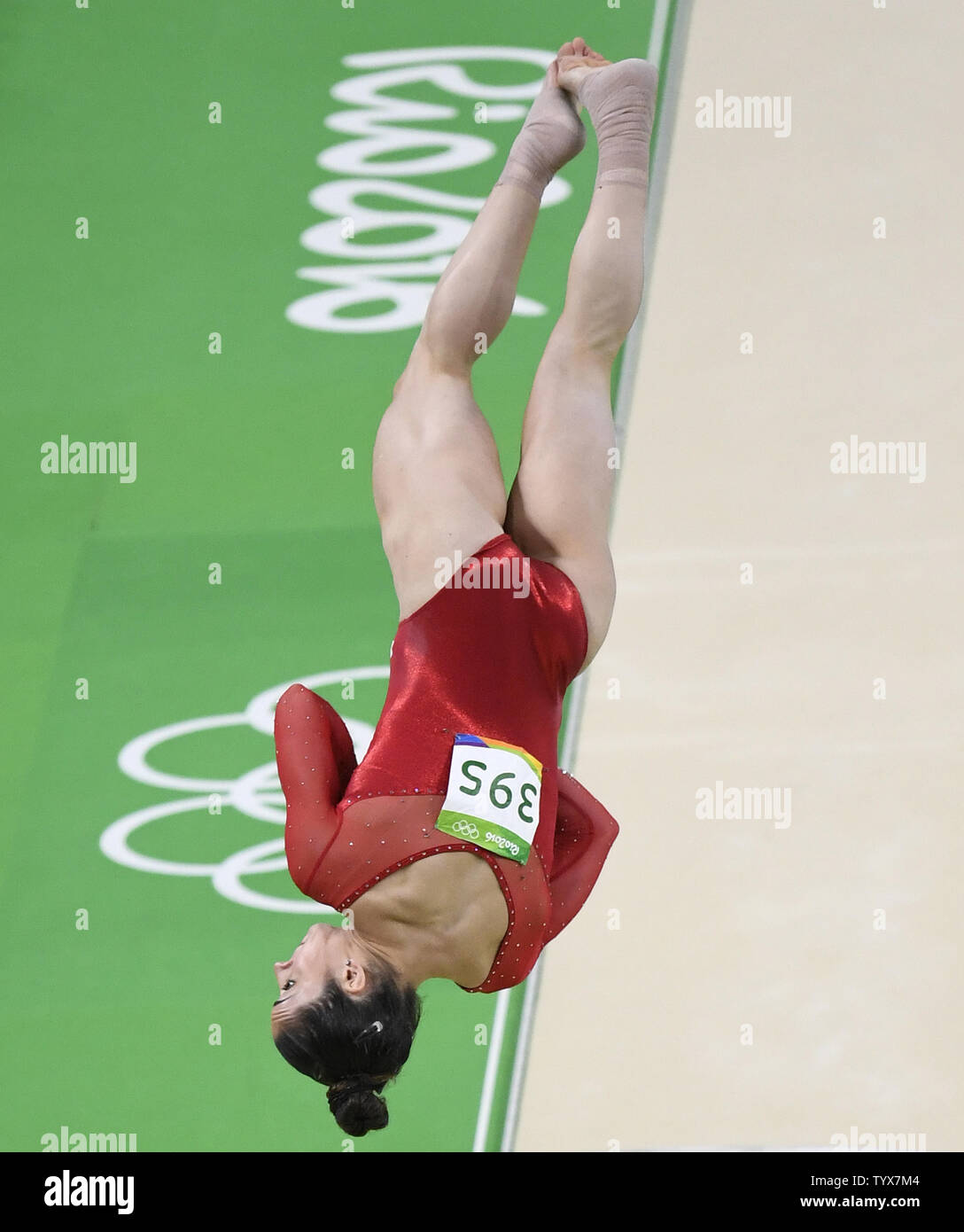 Aly Raisman of the United States competes on the vault in the Women's ...