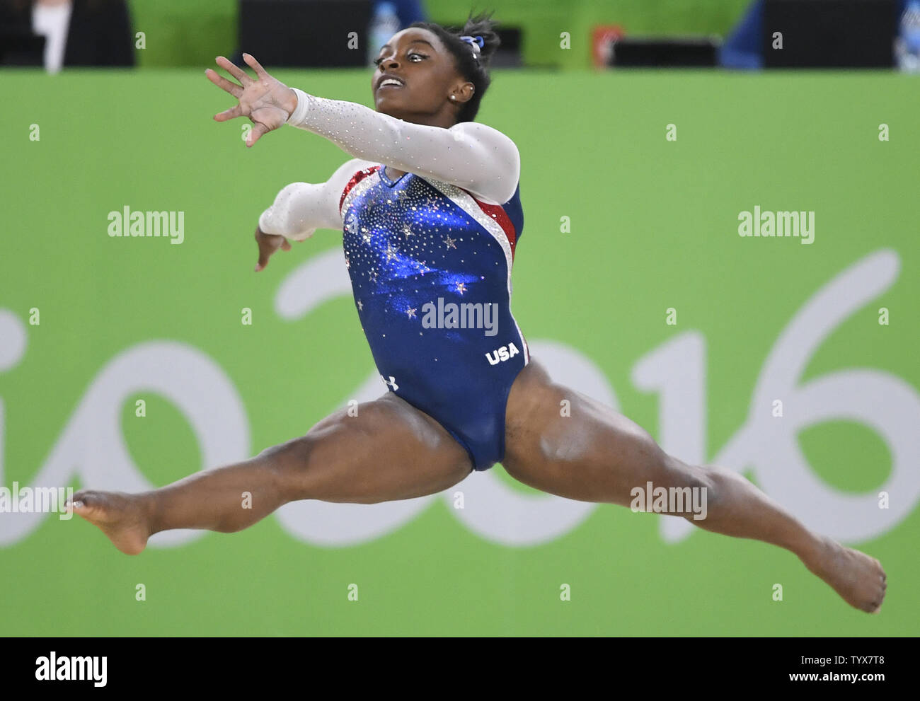 Simone Biles competes in the Floor Exercise in the Women's Artistic ...
