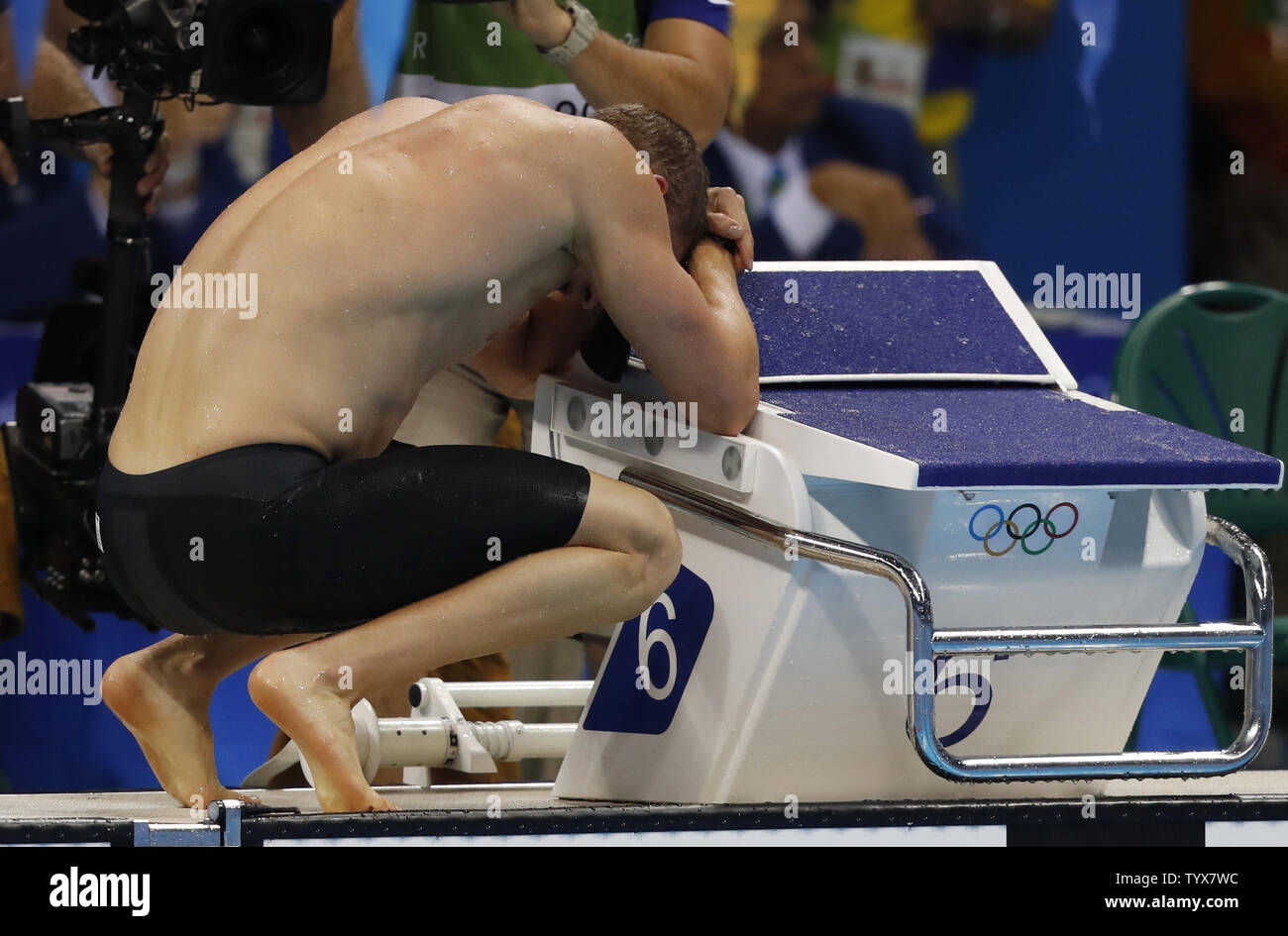 Ryan Murphy of the United States reacts after winning the gold medal in ...